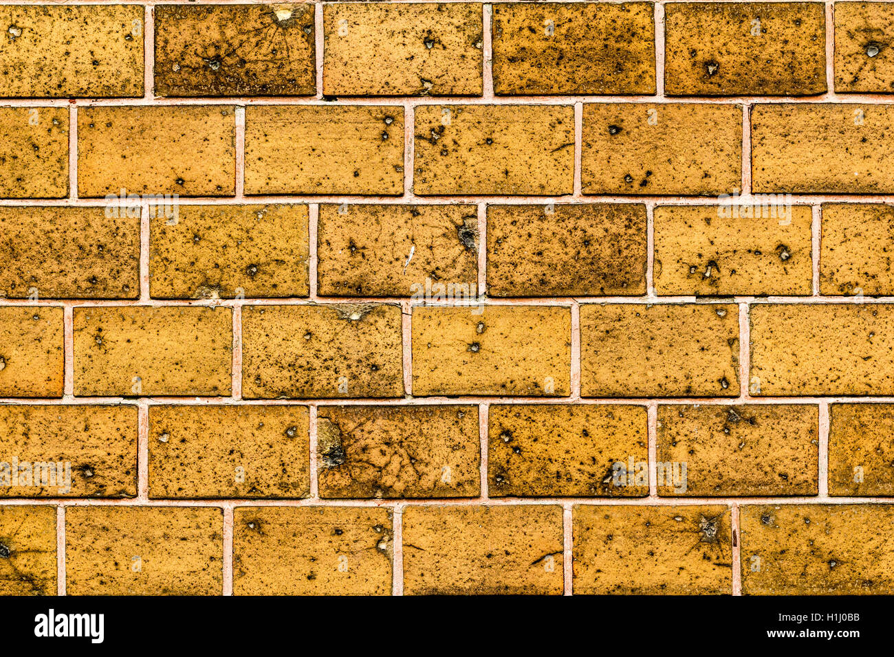 vintage yellow brick wall pattern background Stock Photo - Alamy