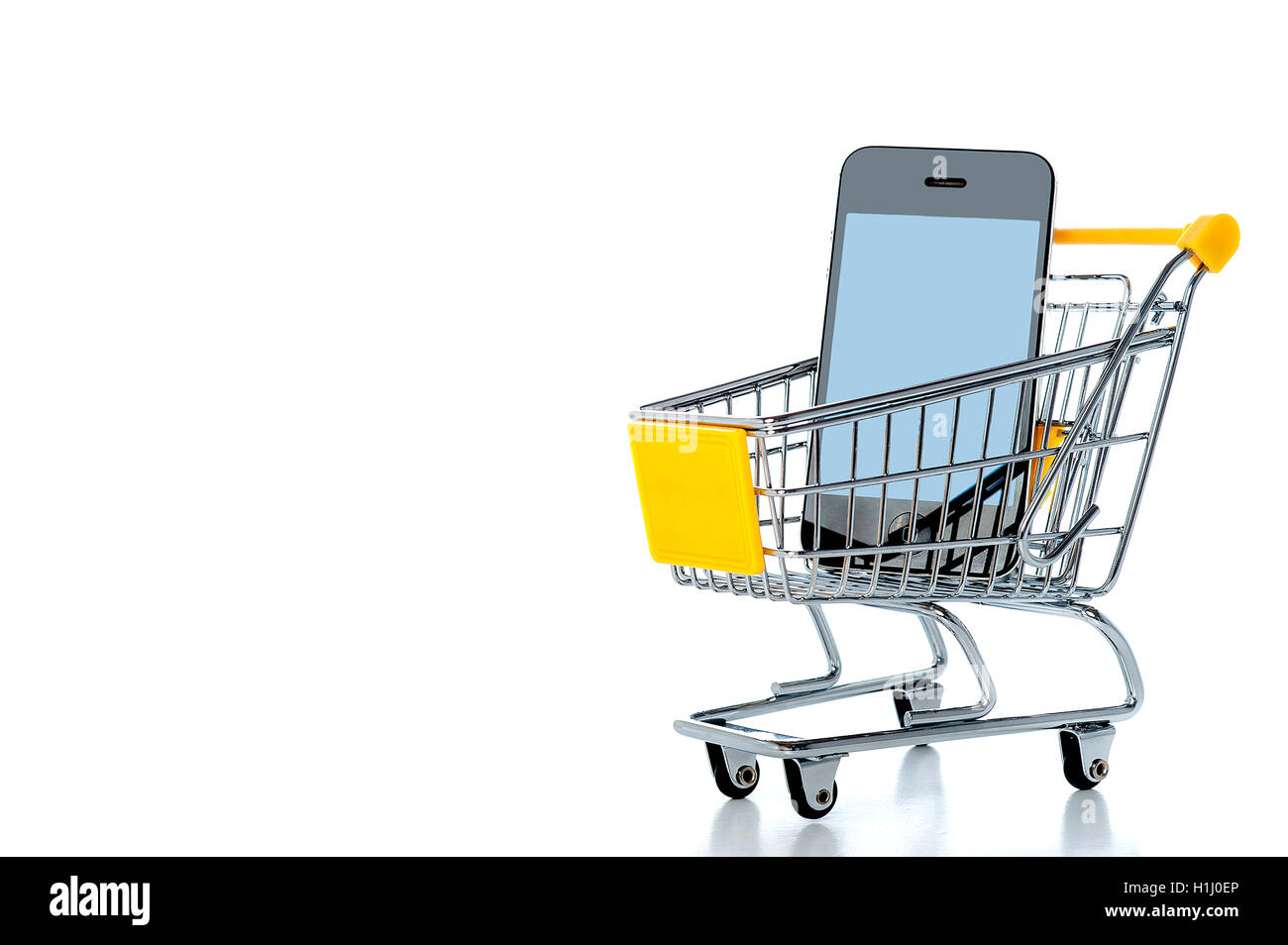 Mobile phone in shopping cart Stock Photo - Alamy
