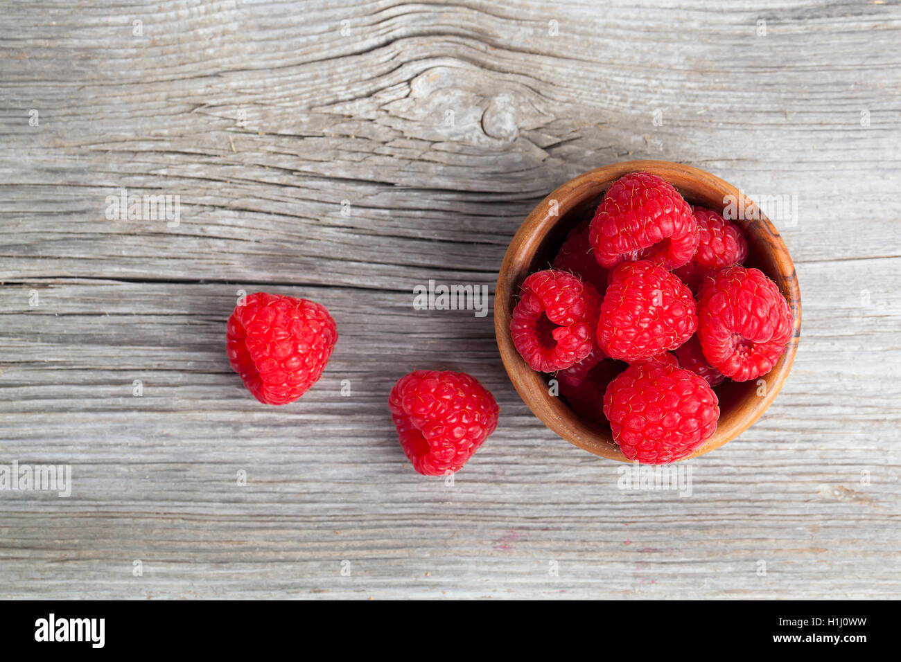 bowl of raspberries Stock Photo - Alamy