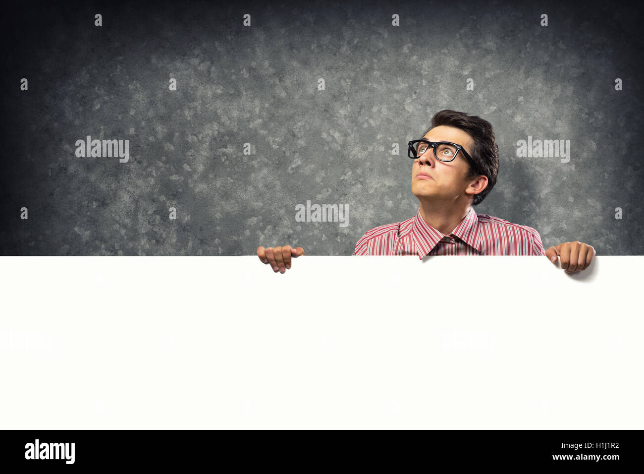 man holding a banner Stock Photo - Alamy