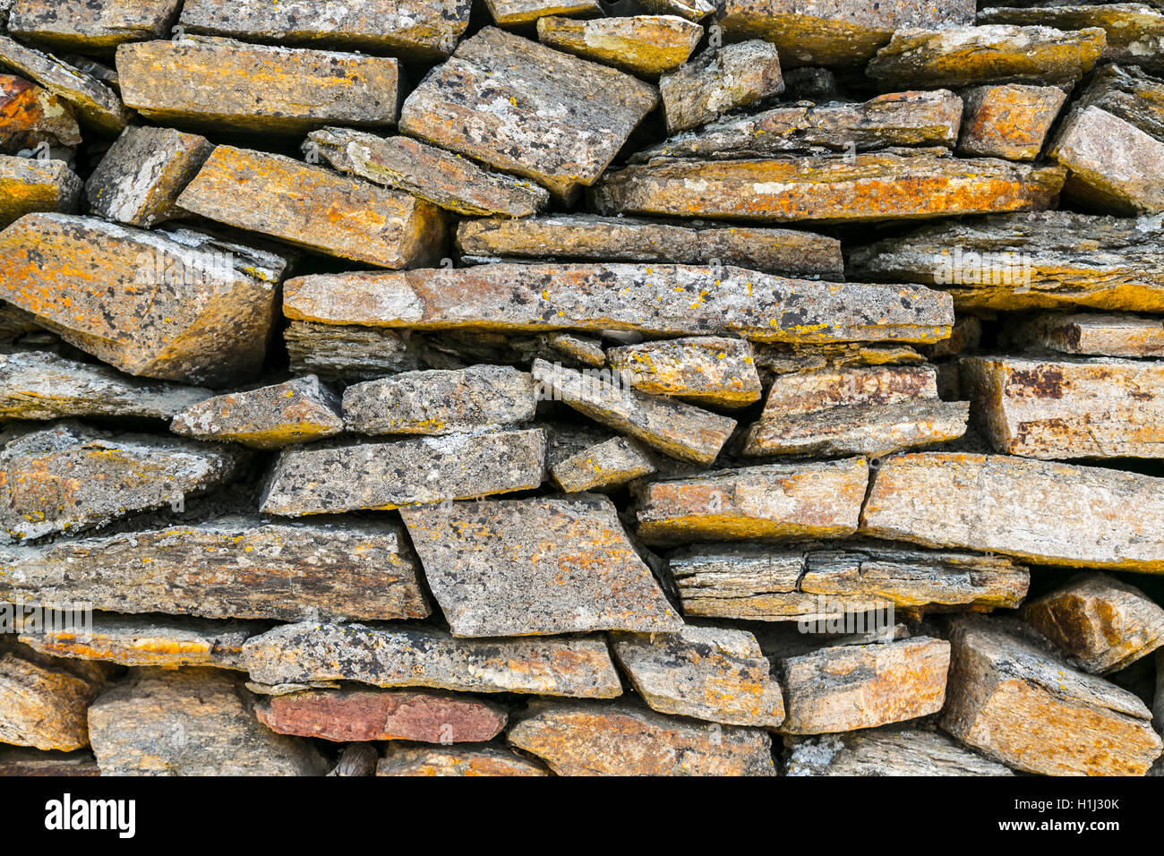 ancient natural stone wall pattern background Stock Photo - Alamy