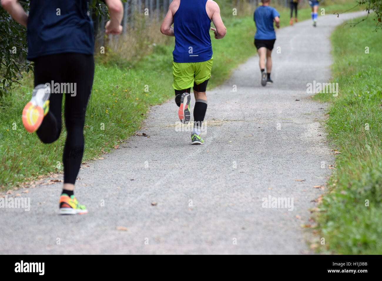 Group of men jogging running hi-res stock photography and images - Alamy