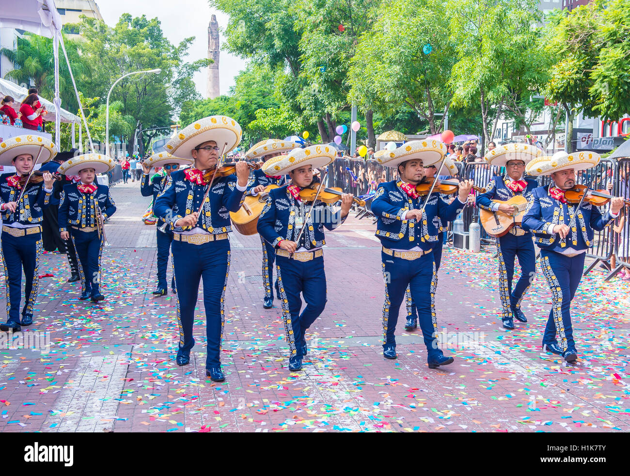 Participants in a parade during the 23rd International Mariachi ...