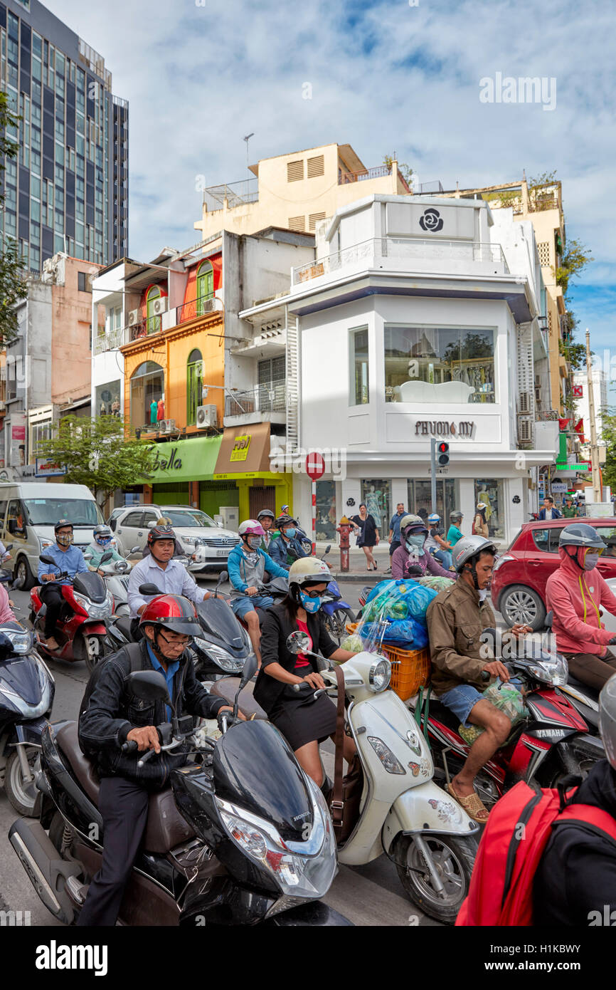 Local people commuting on bikes in District 1. Ho Chi Minh City ...