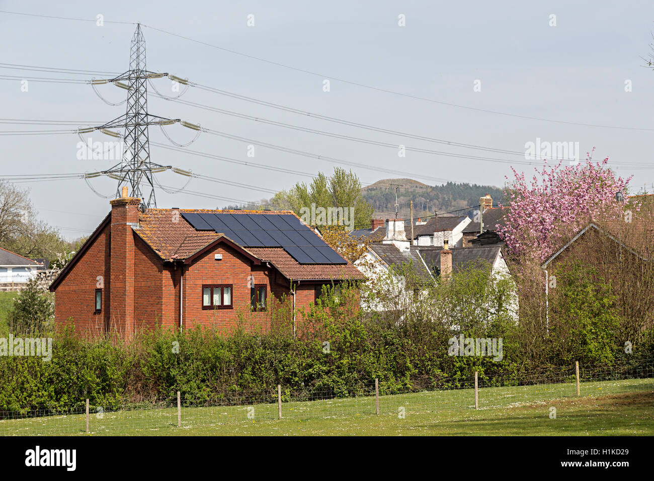 Electric pylon and house hi-res stock photography and images - Alamy