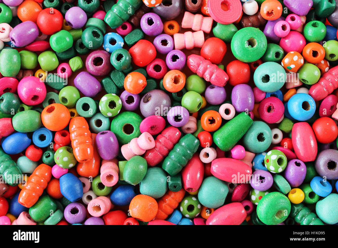 Wooden beads background Stock Photo - Alamy