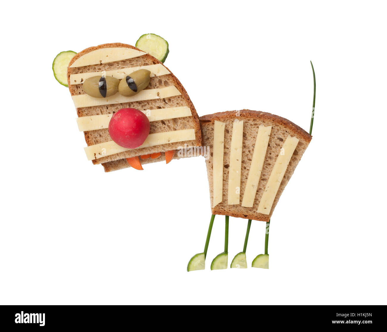 Tiger made of cheese and bread on white background Stock Photo - Alamy