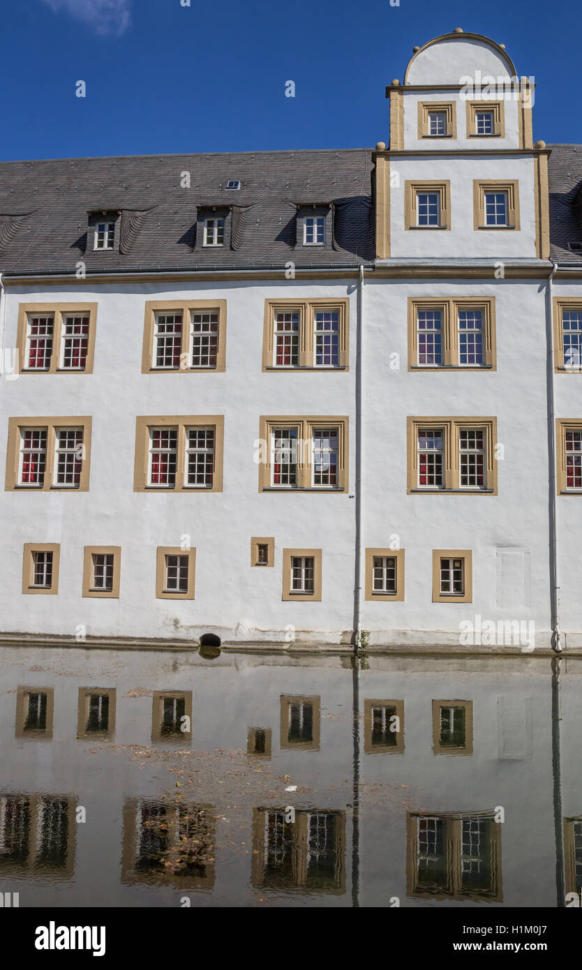 Side view of the Neuhaus castle in Paderborn and reflection in the ...