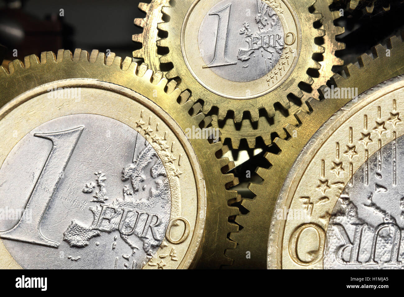 euro coin gears Stock Photo - Alamy