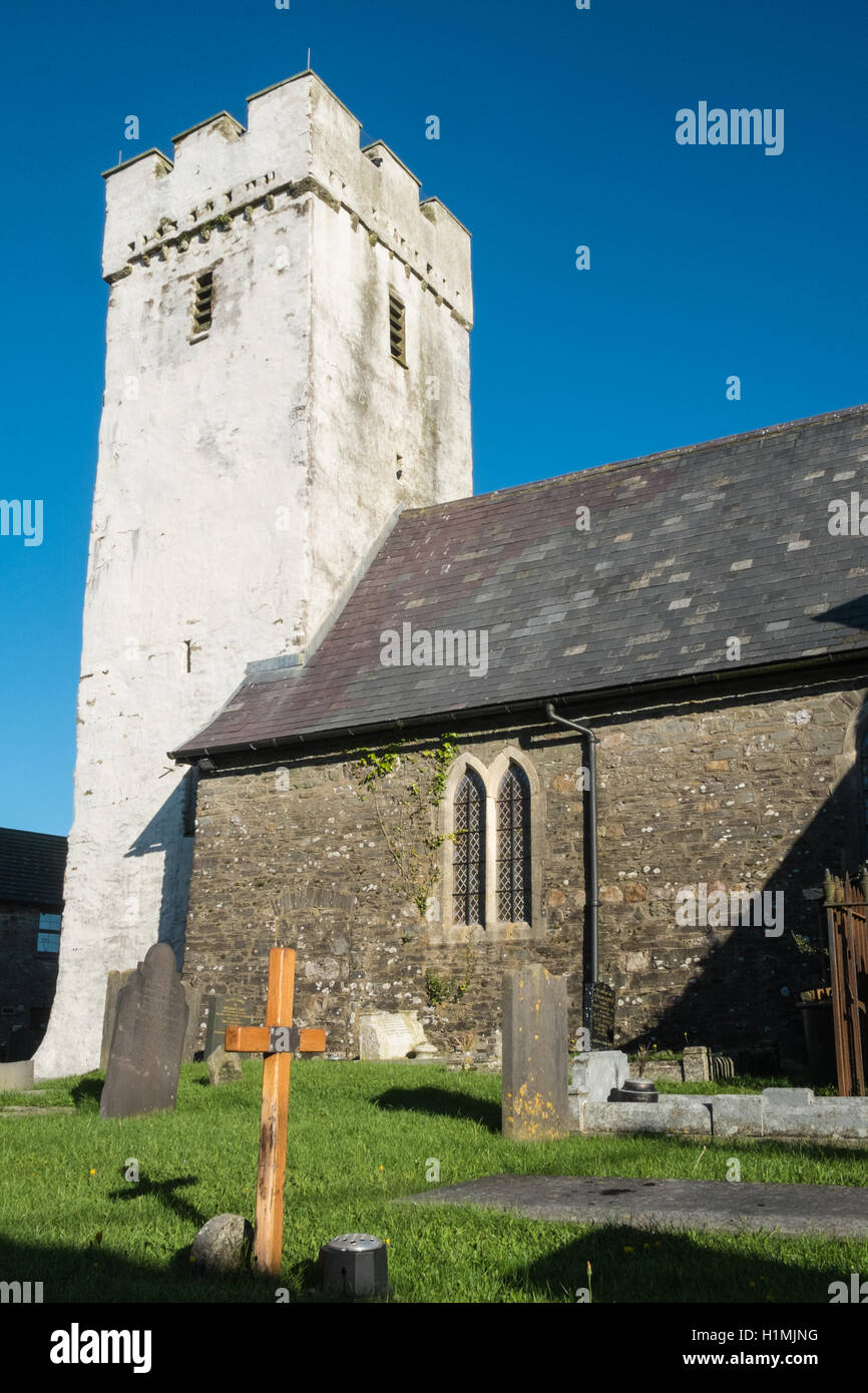 Ancient church and bell tower in centre of village of Llansaint,a ...