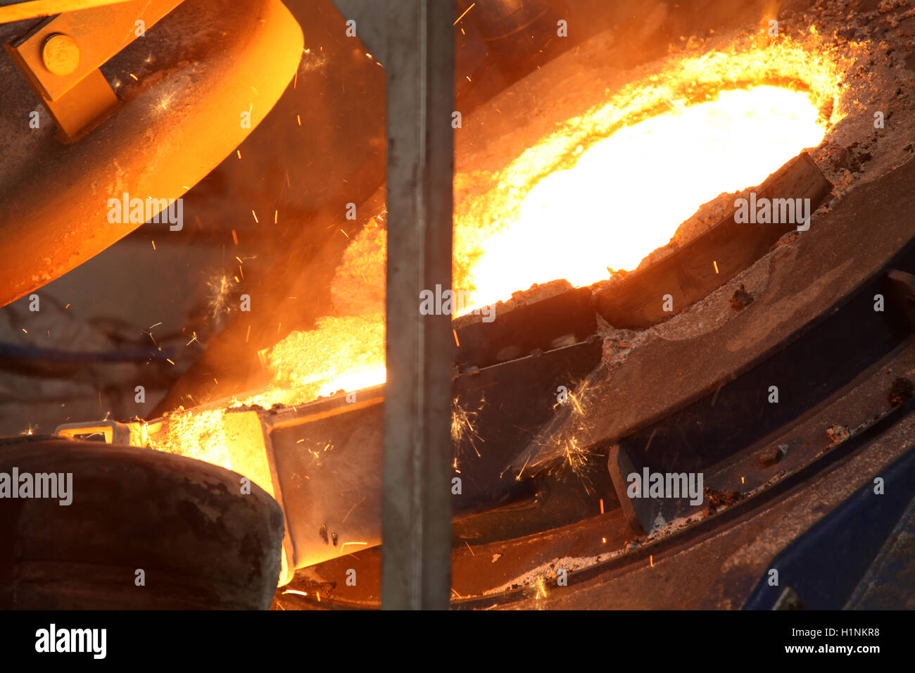 Molten Metal Poured at Foundry Stock Photo - Alamy