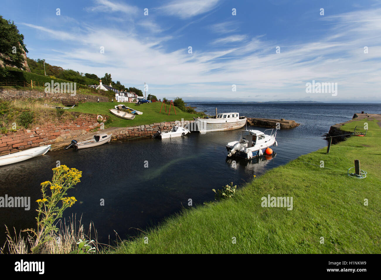 Isle of Arran, Scotland. Corrie Port in the village of Corrie, with the ...
