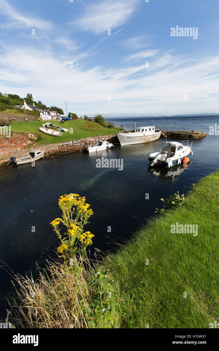 Isle of Arran, Scotland. Corrie Port in the village of Corrie, with the ...