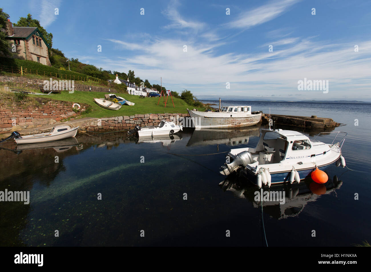 Isle of Arran, Scotland. Corrie Port in the village of Corrie, with the ...