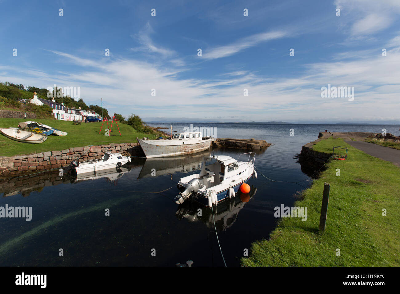 Isle of Arran, Scotland. Corrie Port in the village of Corrie, with the ...