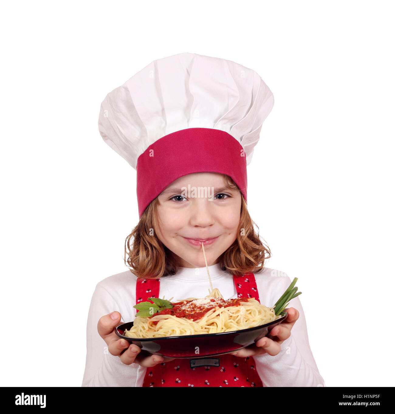 little girl cook eat spaghetti Stock Photo - Alamy