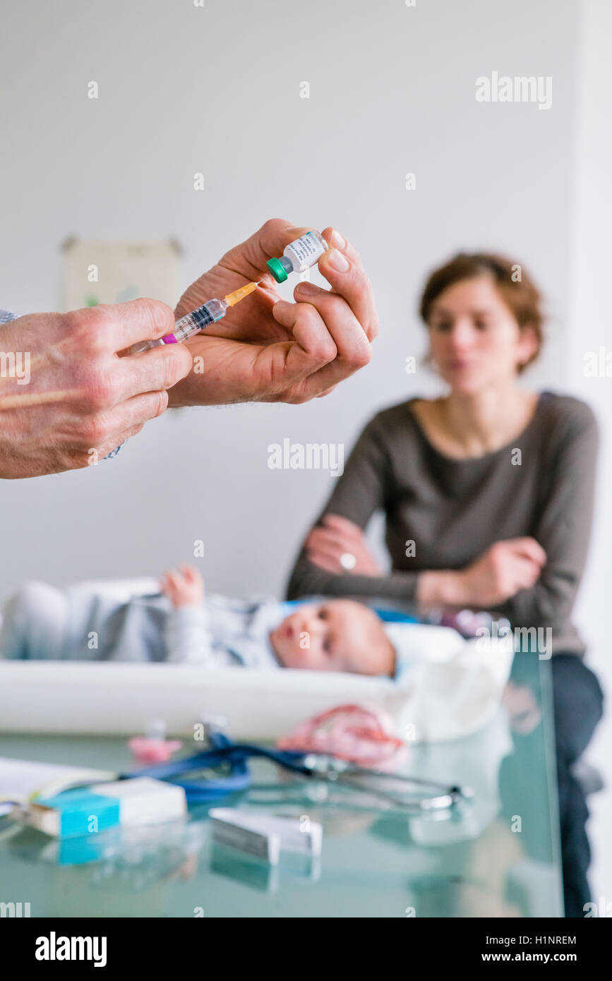 3 month old baby receiving Infanrix Hexa vaccination Stock Photo - Alamy