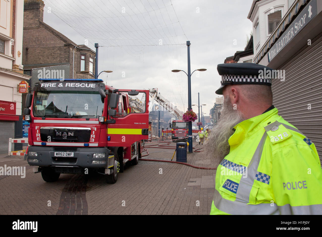 Police officer at scene of major fire in Great Yarmouth, UK Stock Photo ...