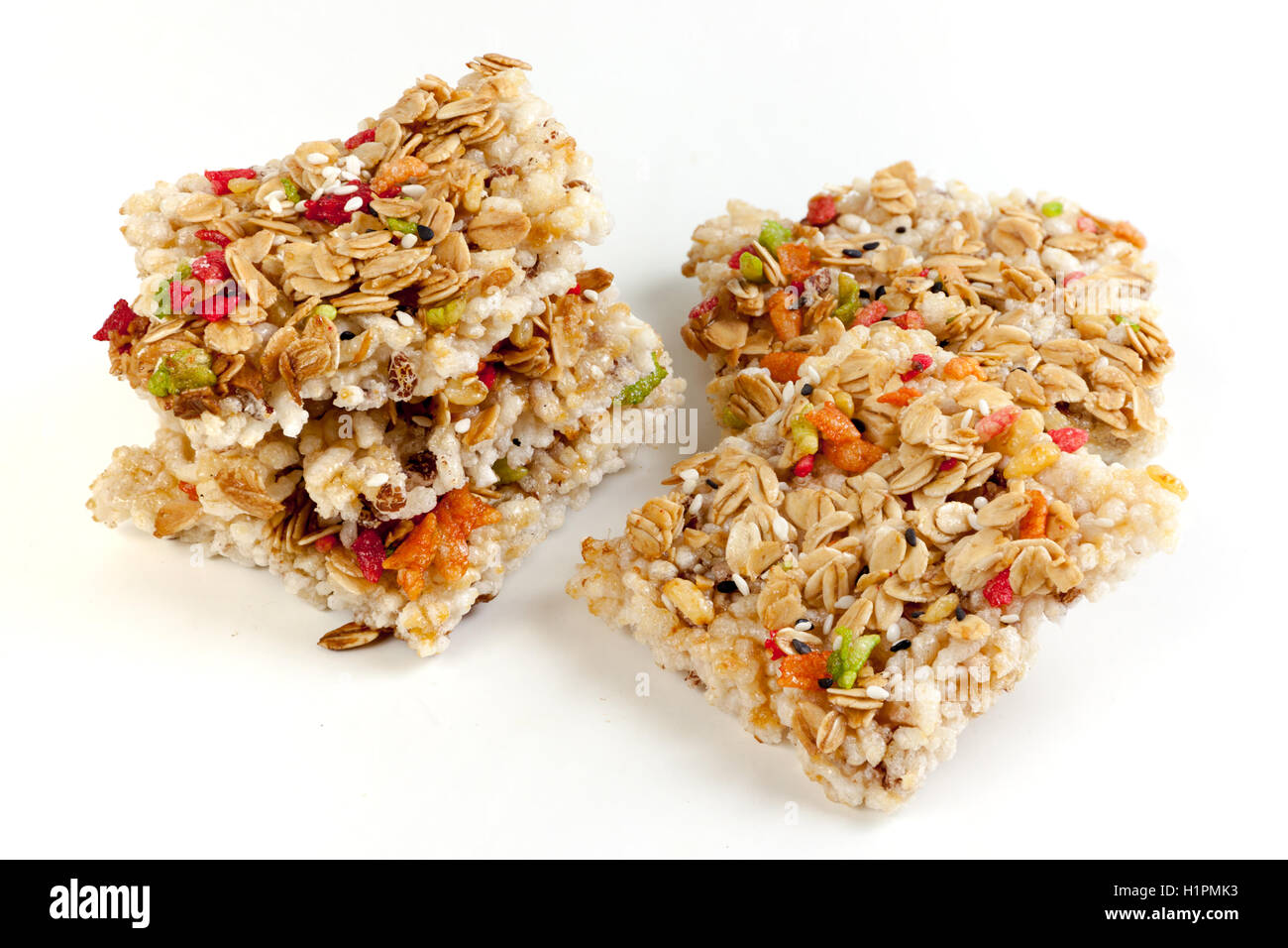 Crispy rice crust with honey topping on grains. many grains on white ...