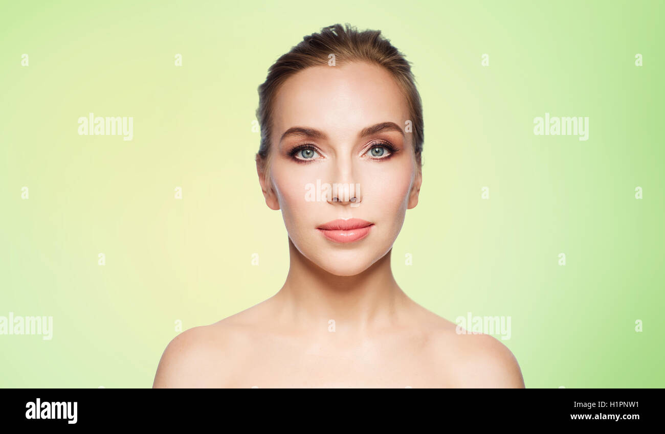 beautiful young woman face over white background Stock Photo - Alamy