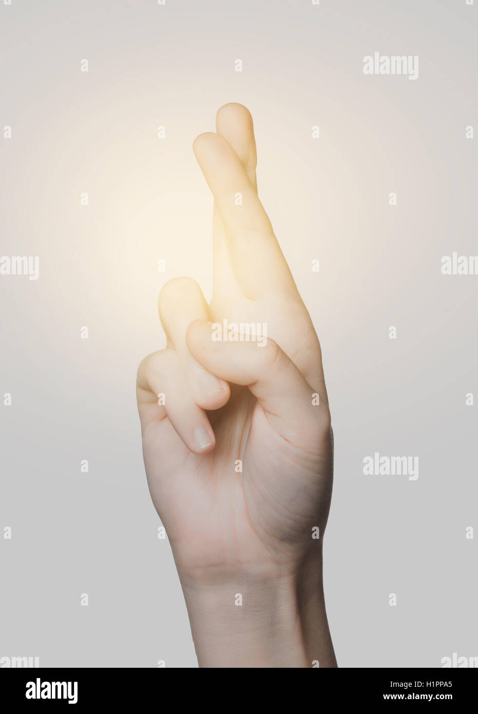 Female hand fingers crossed hi-res stock photography and images - Alamy