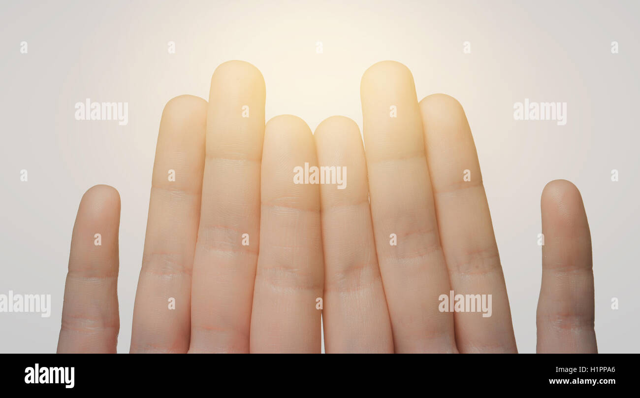 close up of hands showing eight fingers Stock Photo - Alamy