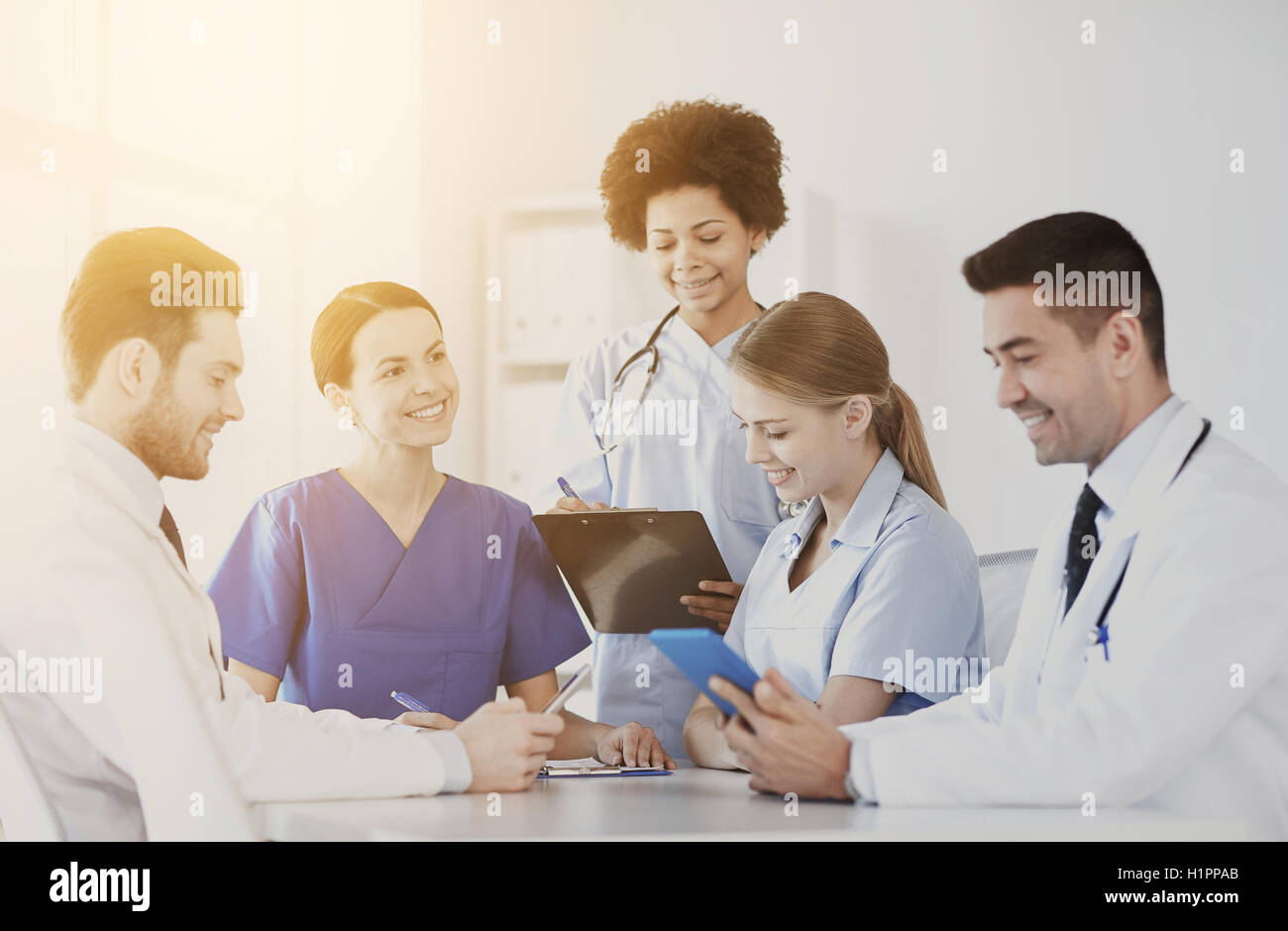 group of happy doctors meeting at hospital office Stock Photo - Alamy