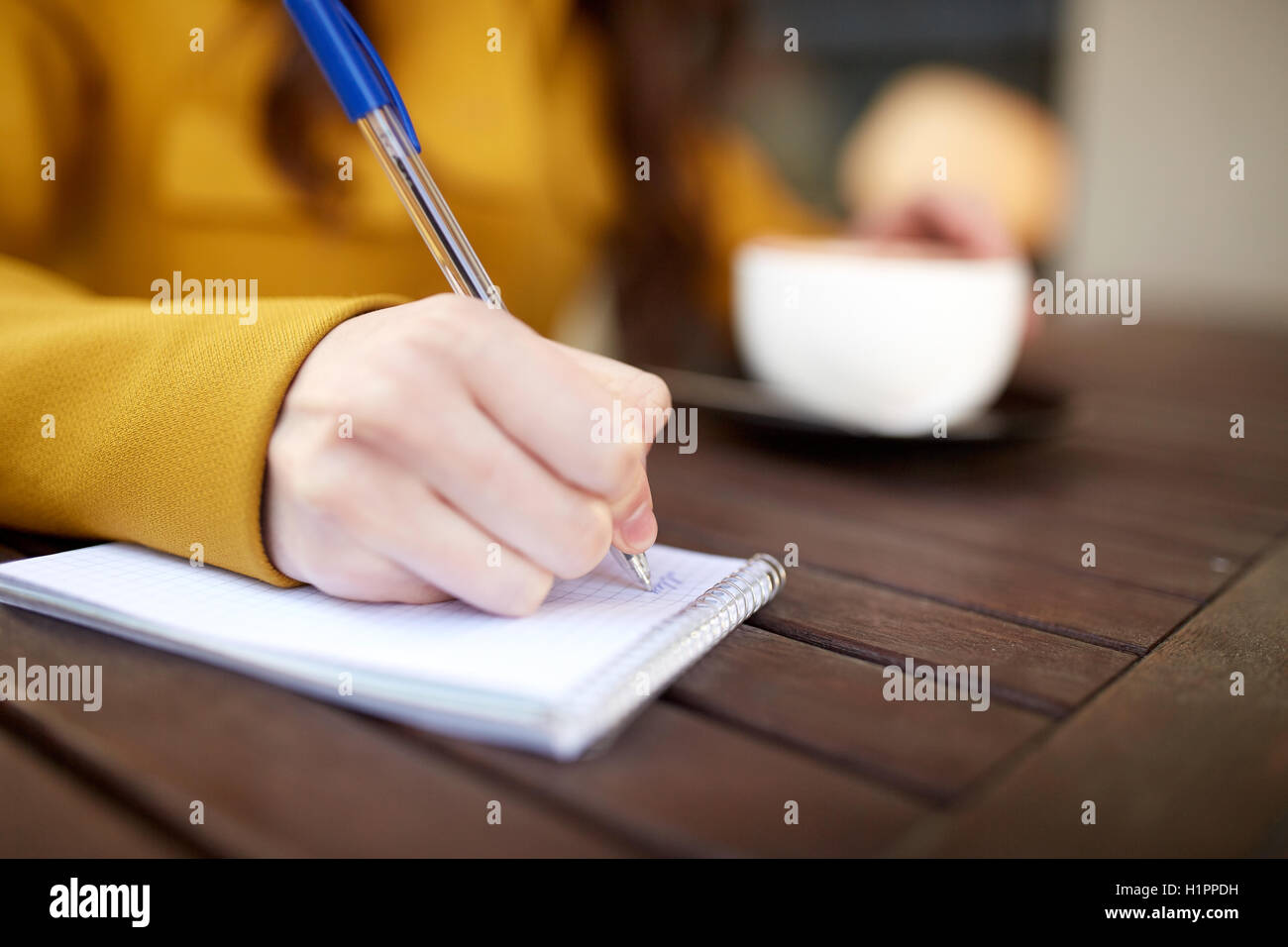 Teen hand writing hi-res stock photography and images - Alamy