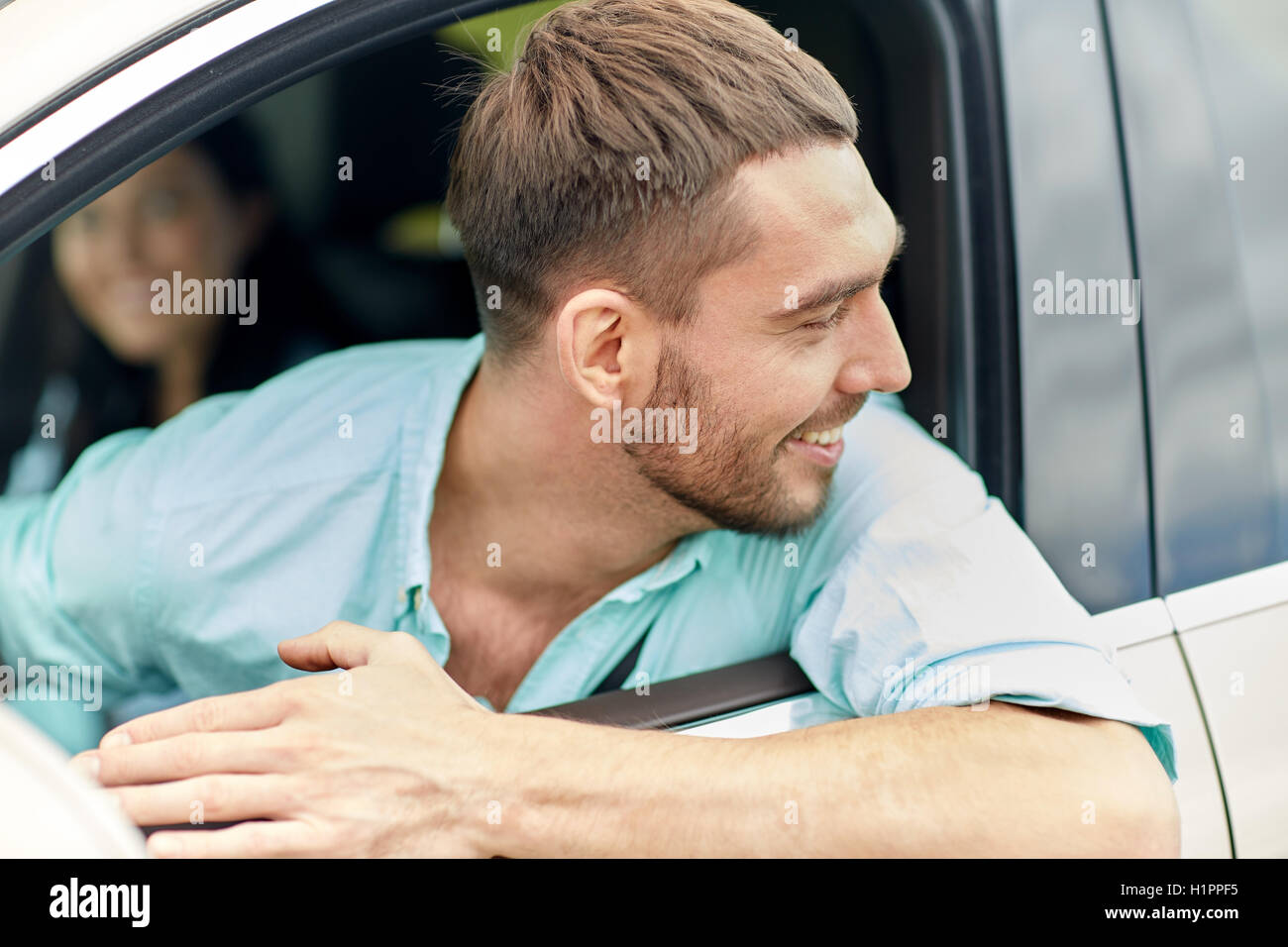 happy smiling man driving in car Stock Photo - Alamy