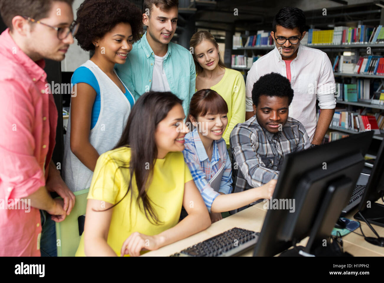 international students with computers at library Stock Photo - Alamy