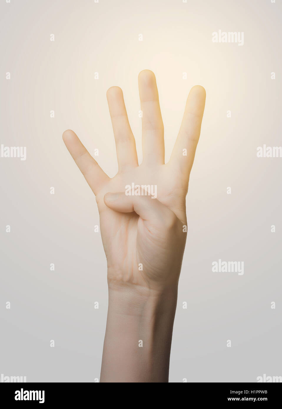 close up of hand showing four fingers Stock Photo - Alamy