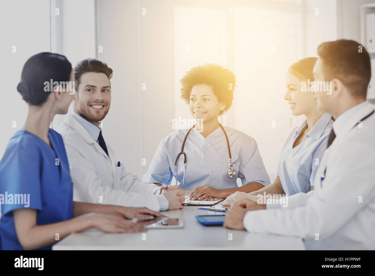 group of happy doctors meeting at hospital office Stock Photo - Alamy