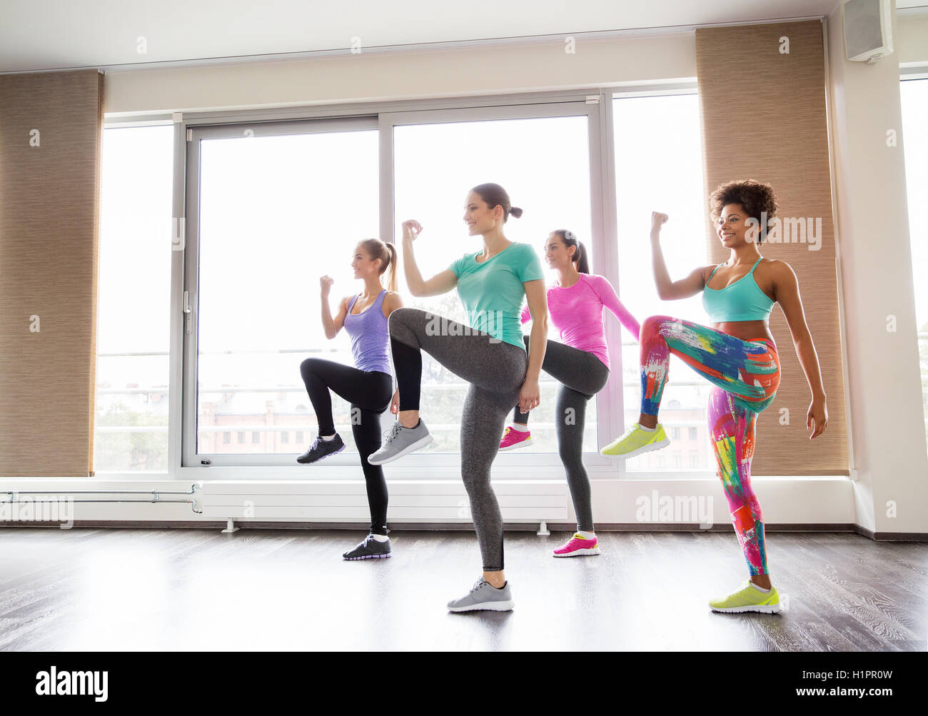 group of happy women working out in gym Stock Photo - Alamy