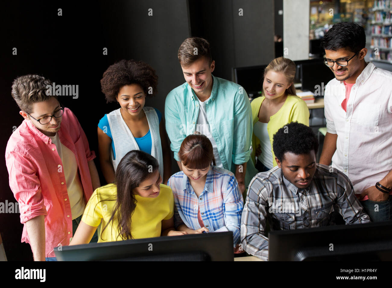 international students with computers at library Stock Photo - Alamy
