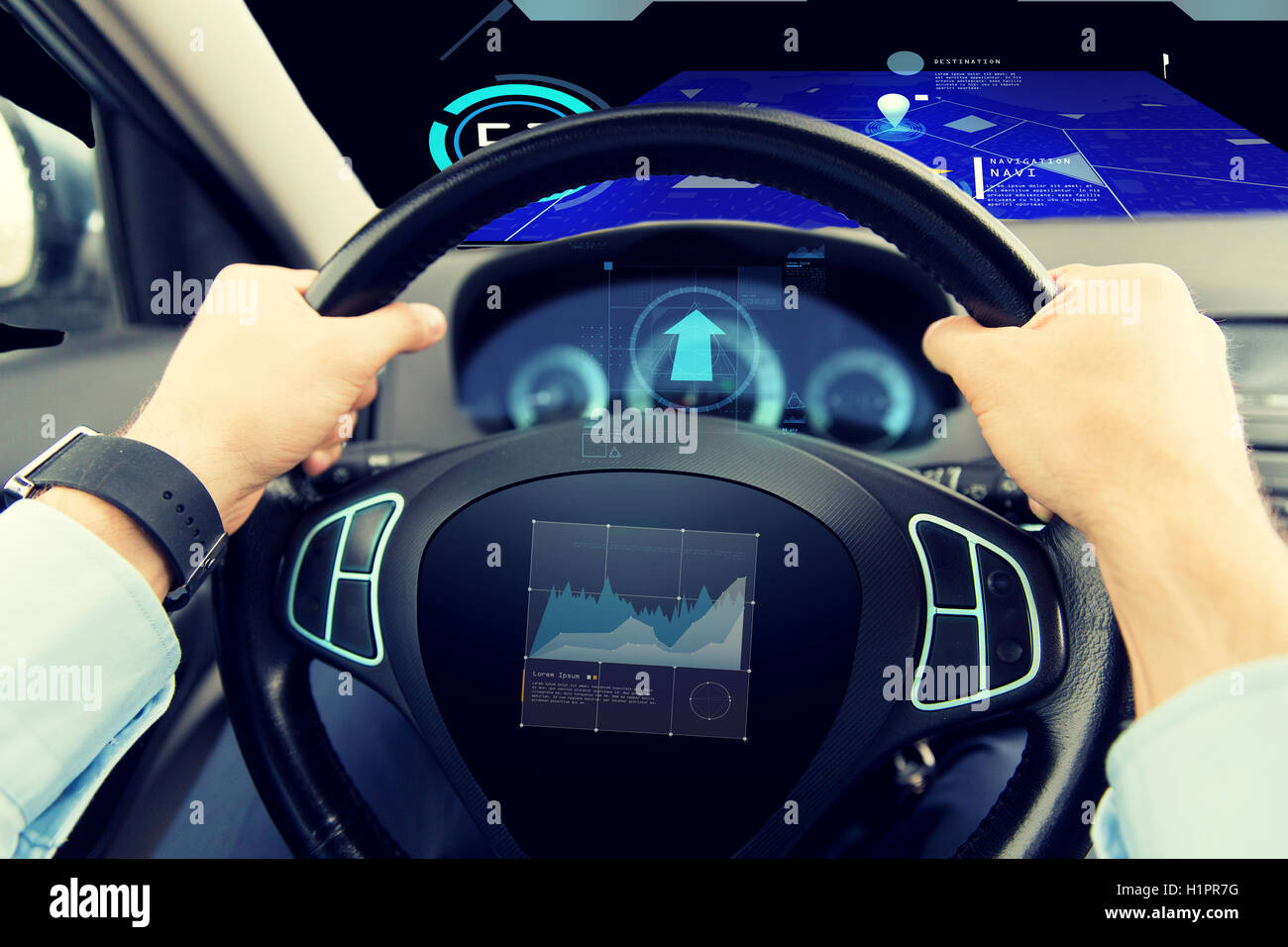 close up of man driving car with graph on screen Stock Photo - Alamy