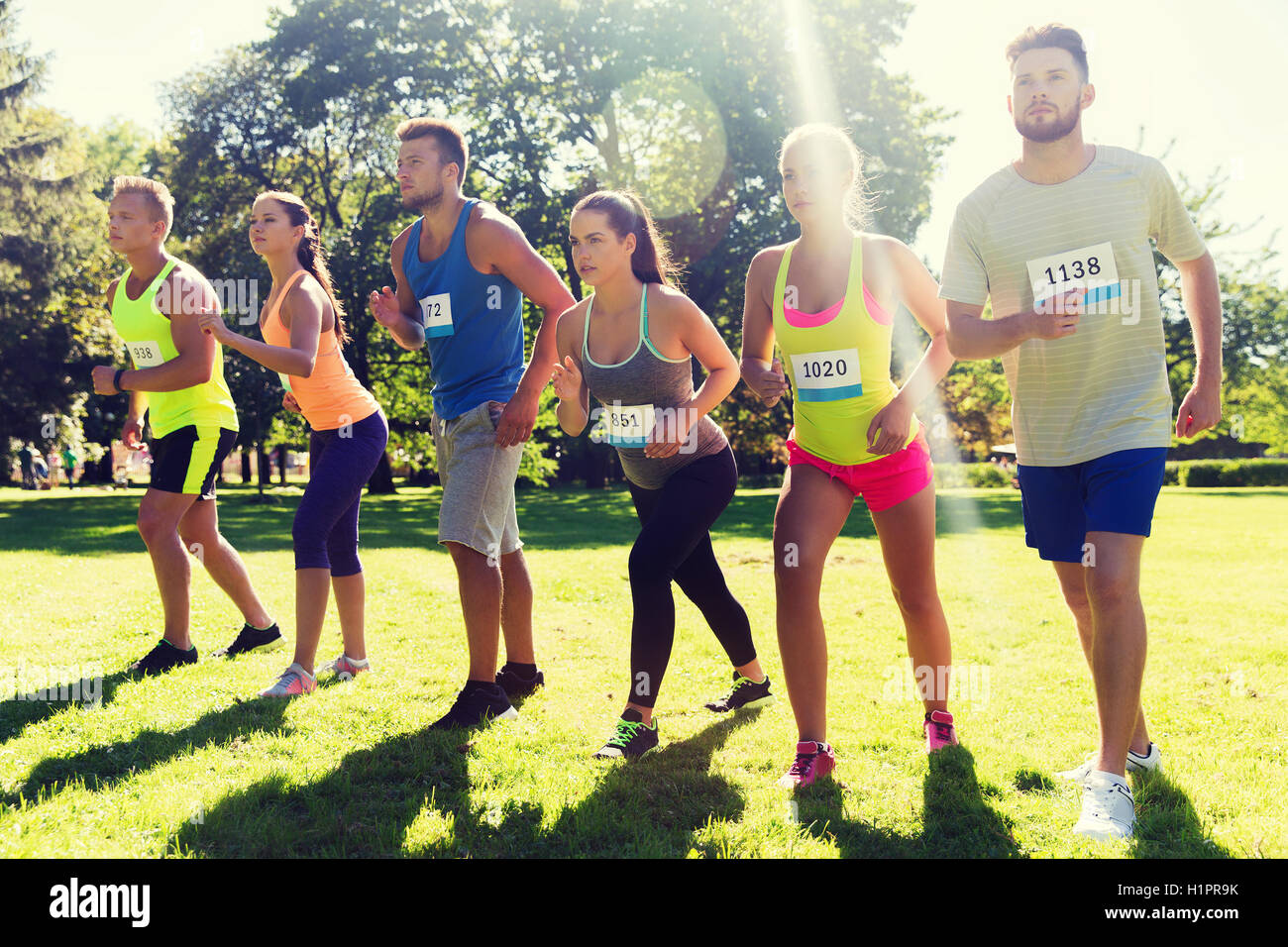 Girl running marathon badge number hi-res stock photography and images ...