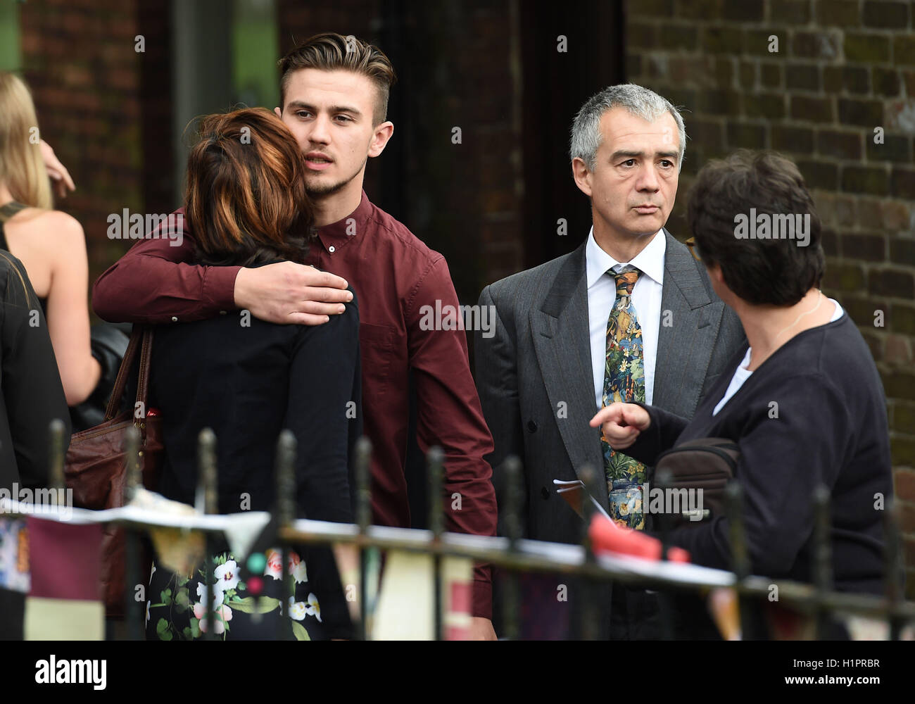 Mother Rosie Ayliffe (left) is consoled as her brother Mark Ayliffe ...