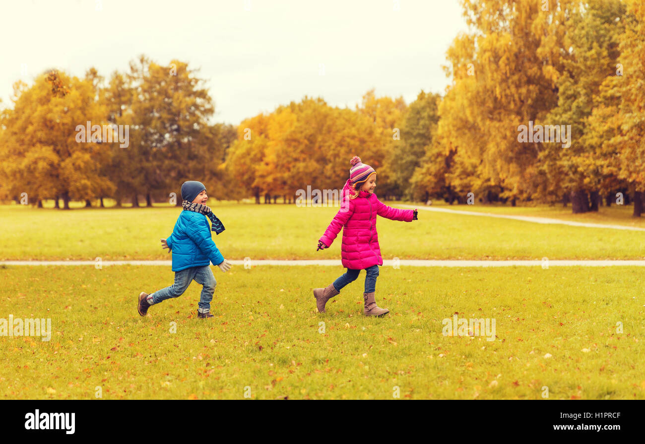 group of happy little kids running outdoors Stock Photo - Alamy