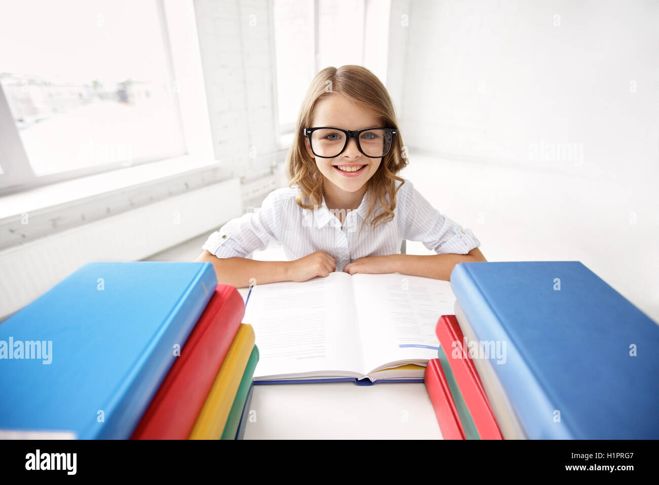 Happy school girl hi-res stock photography and images - Alamy