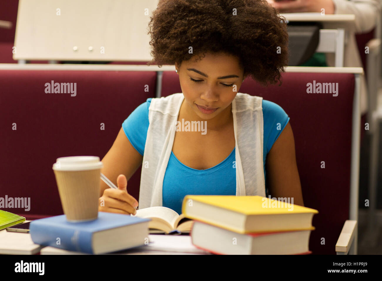 Girl college student lecture hall hi-res stock photography and images ...
