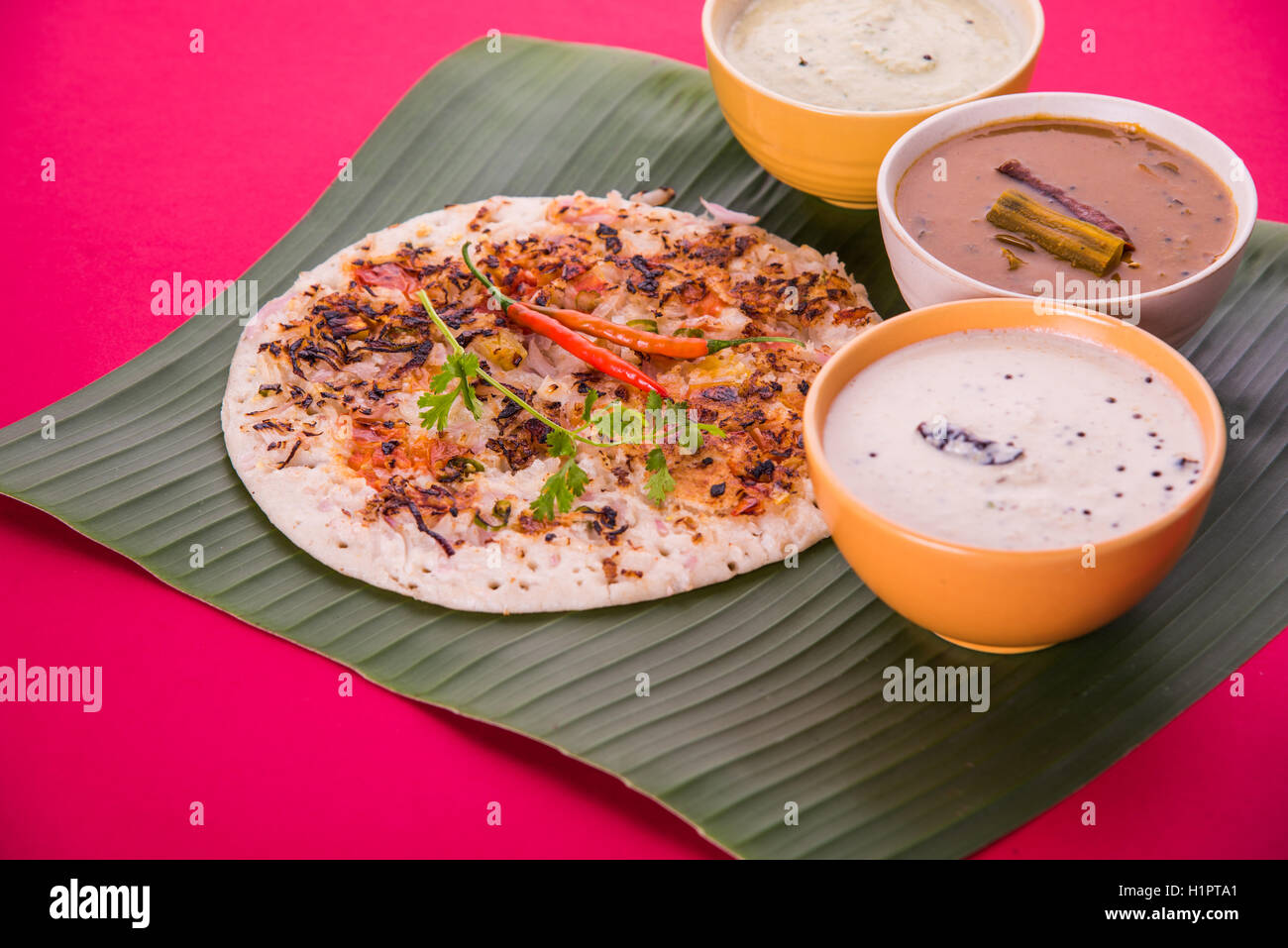 South Indian Food Uttapam or ooththappam or Uthappa is a dosa-like dish ...