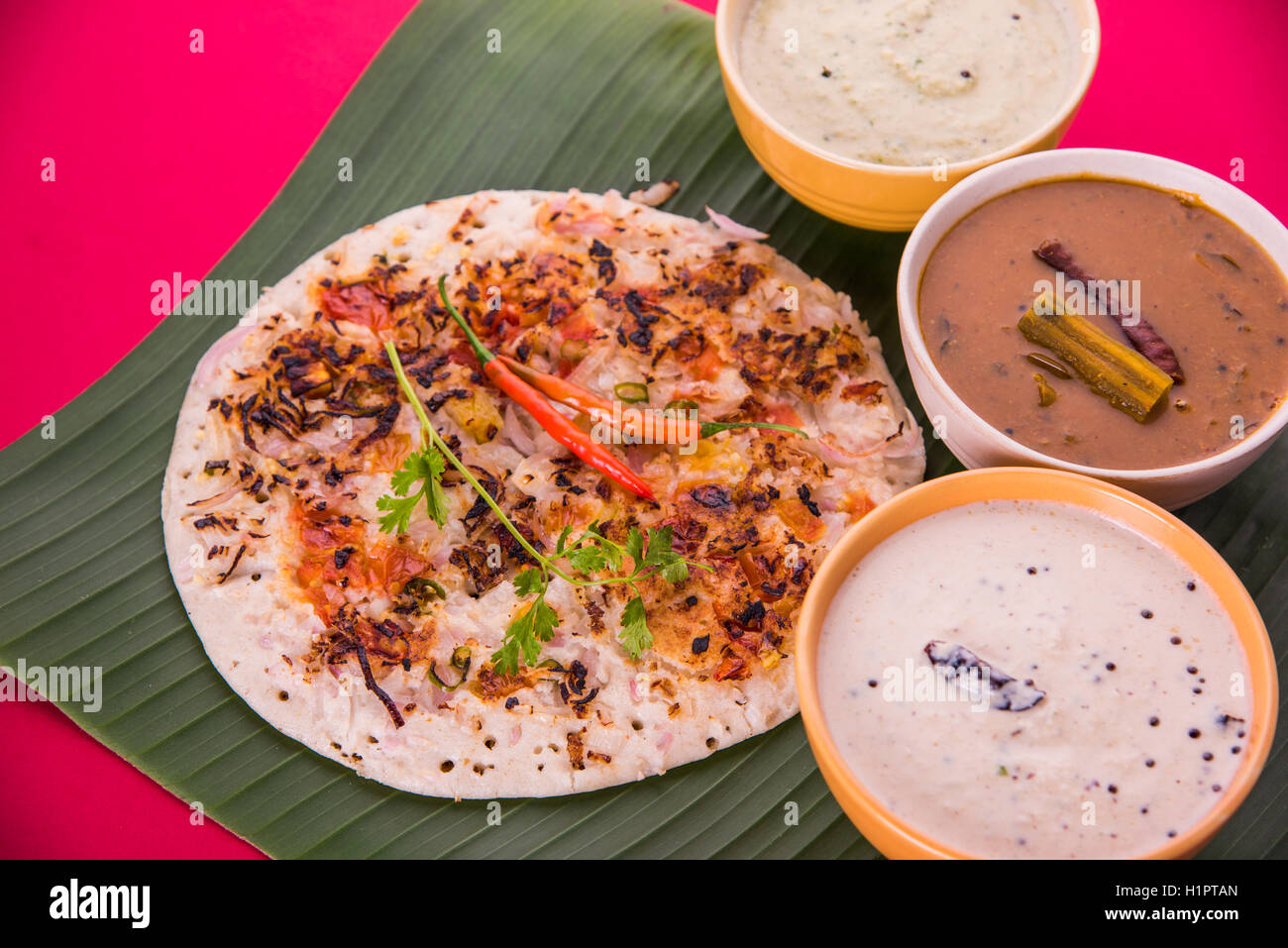 South Indian Food Uttapam or ooththappam or Uthappa is a dosa-like dish ...