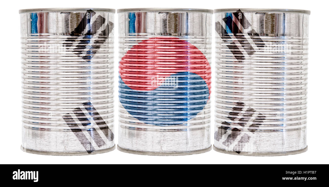 Three tin cans with the flag of South Korea on them isolated on a white ...