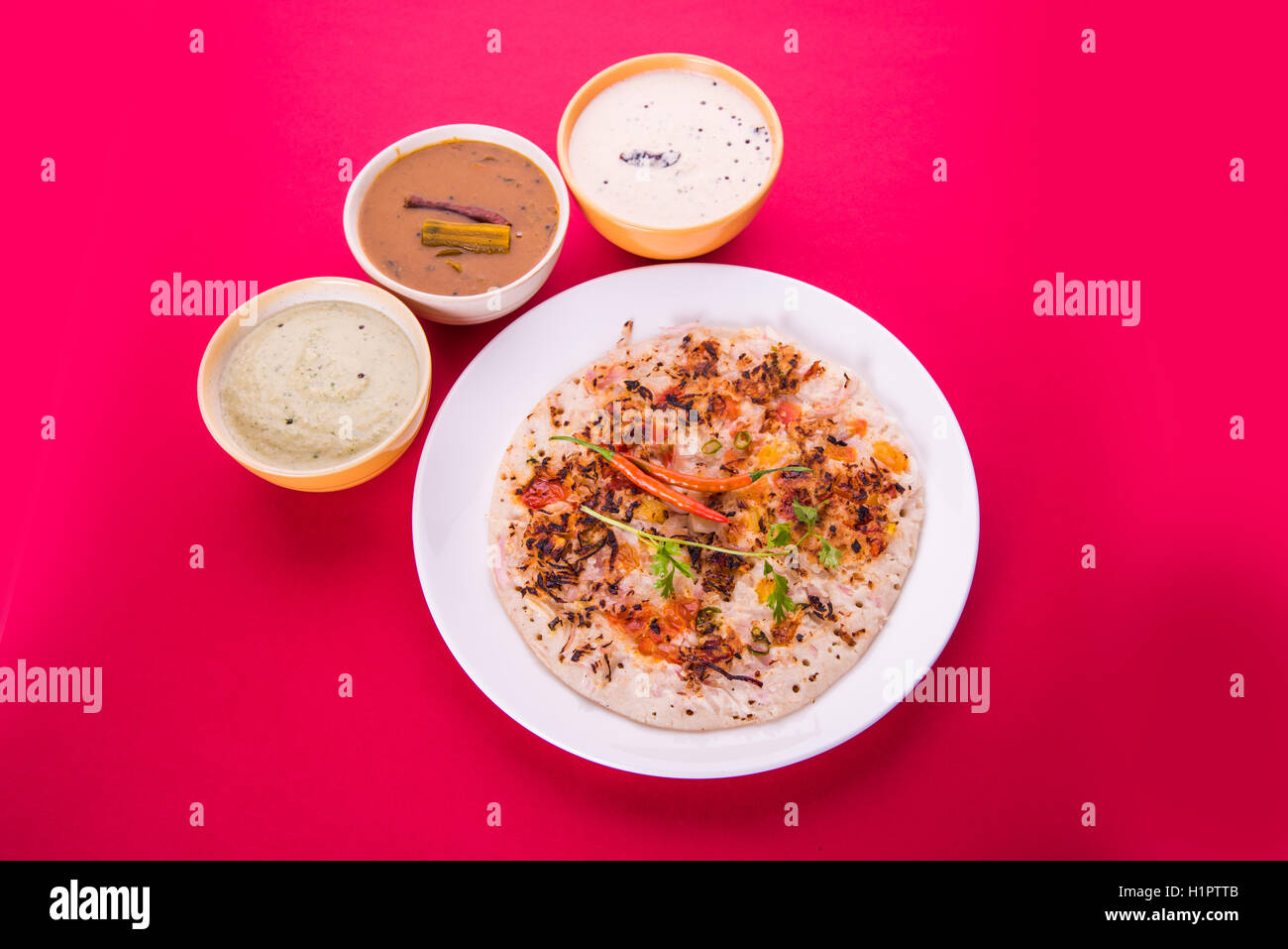 South Indian Food Uttapam or ooththappam or Uthappa is a dosa-like dish ...