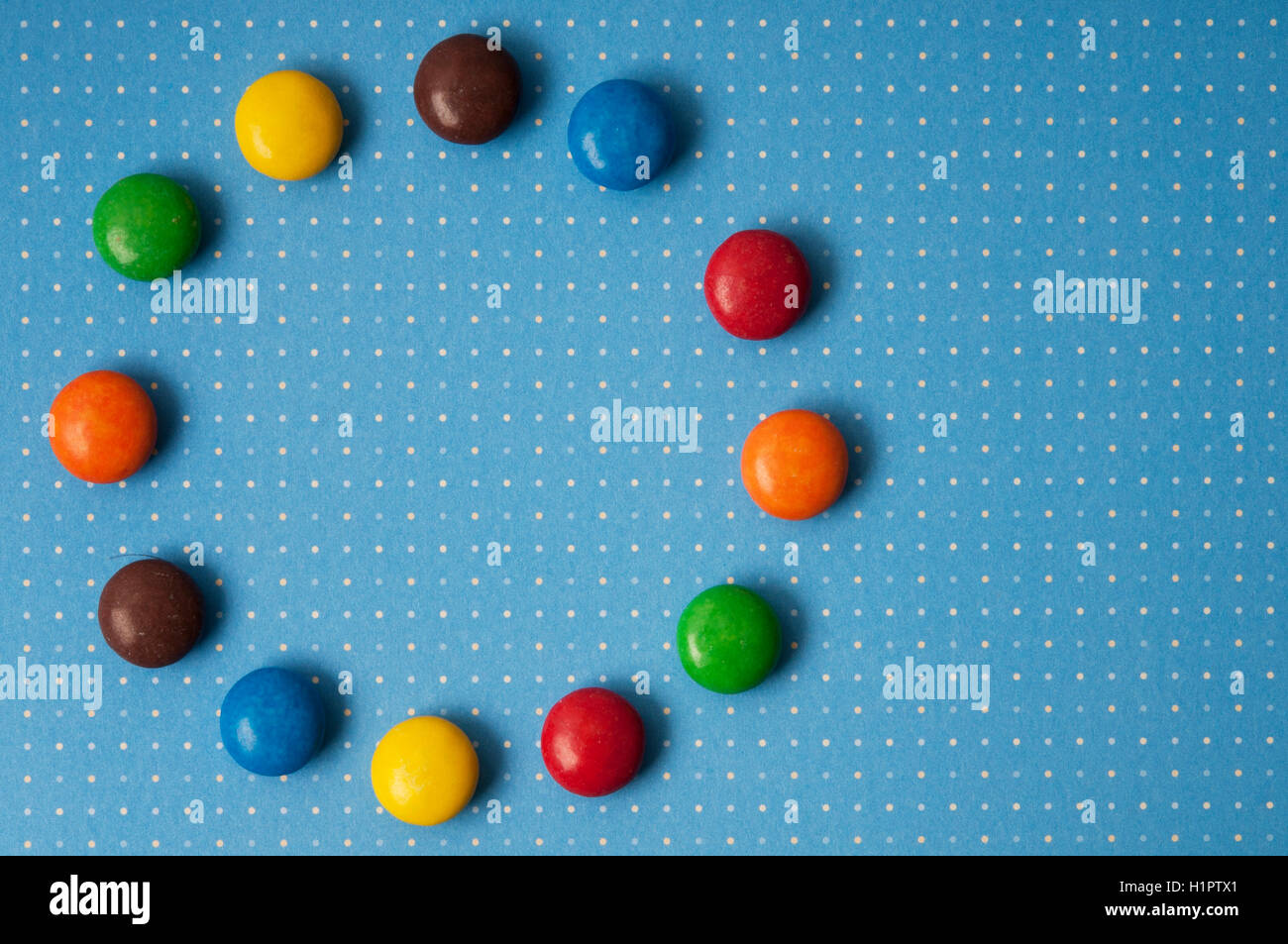 colourful circle of candies Stock Photo - Alamy