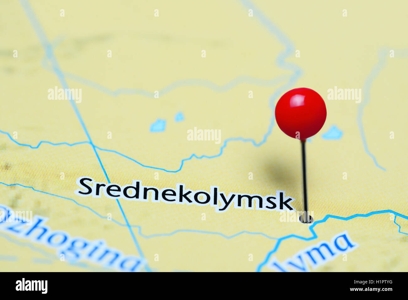 Srednekolymsk pinned on a map of Russia Stock Photo - Alamy