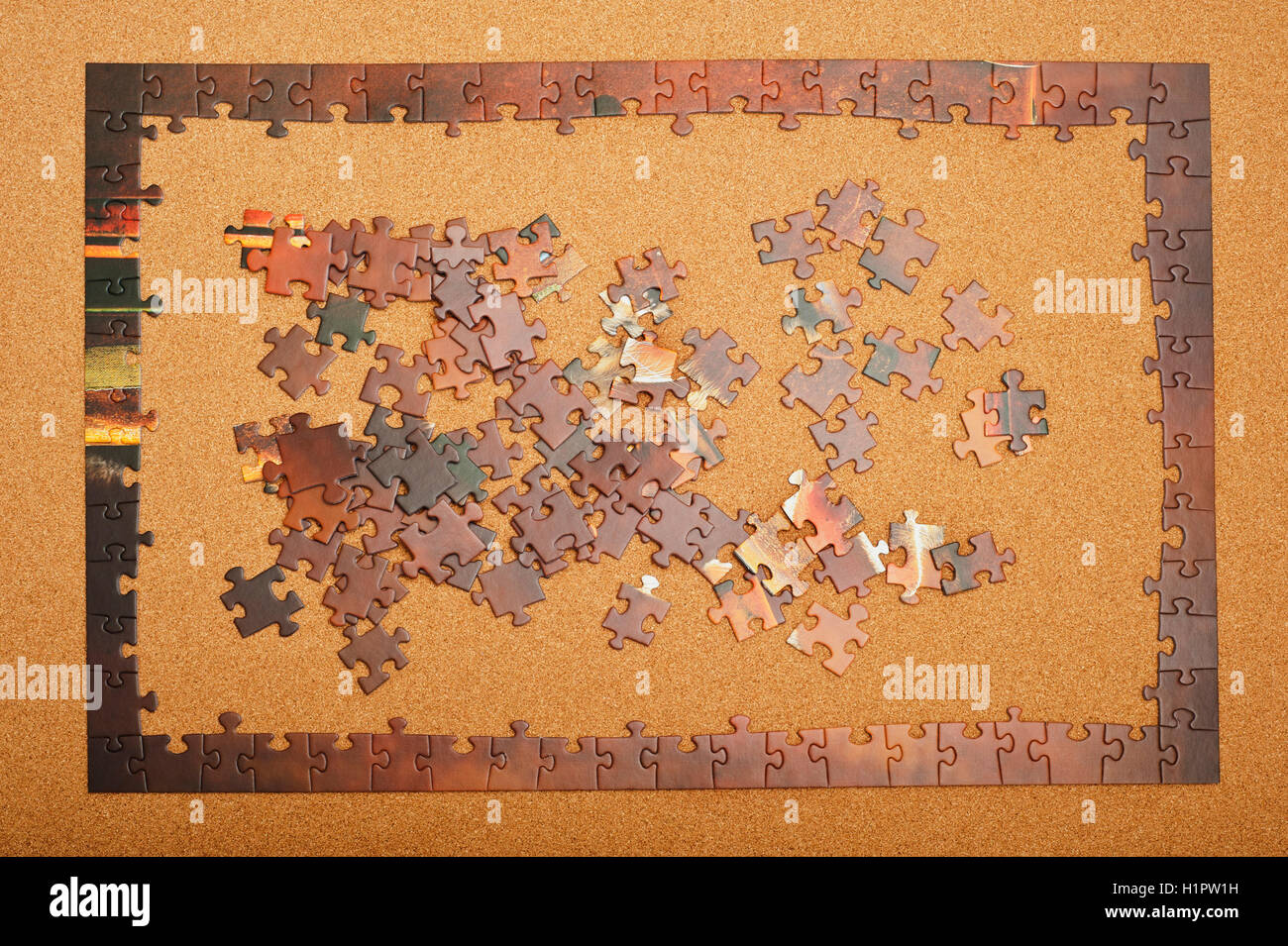 beginning of a jigsaw puzzle - the frame Stock Photo - Alamy
