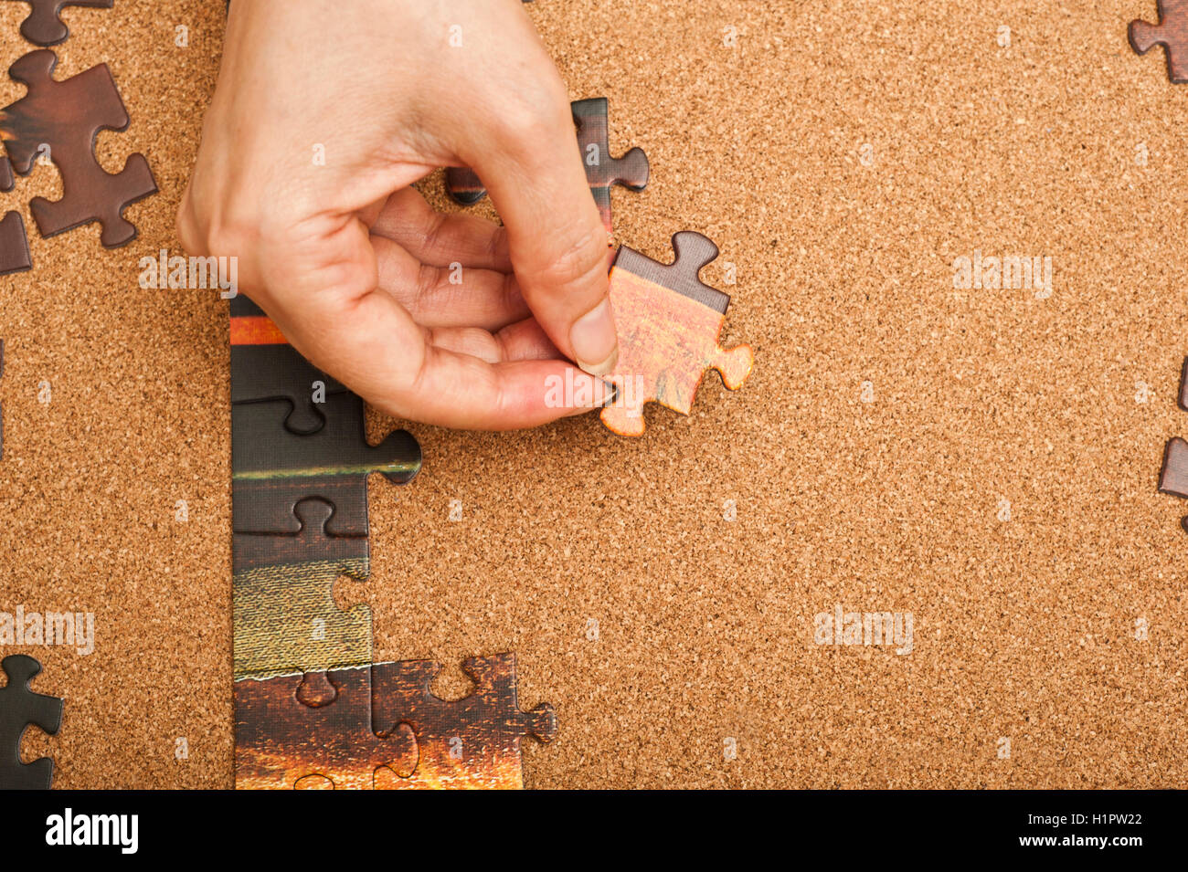 Assembling hand hi-res stock photography and images - Alamy