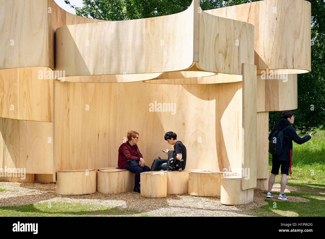 Barkow Leibinger's summer house with people seated. The Summer House ...