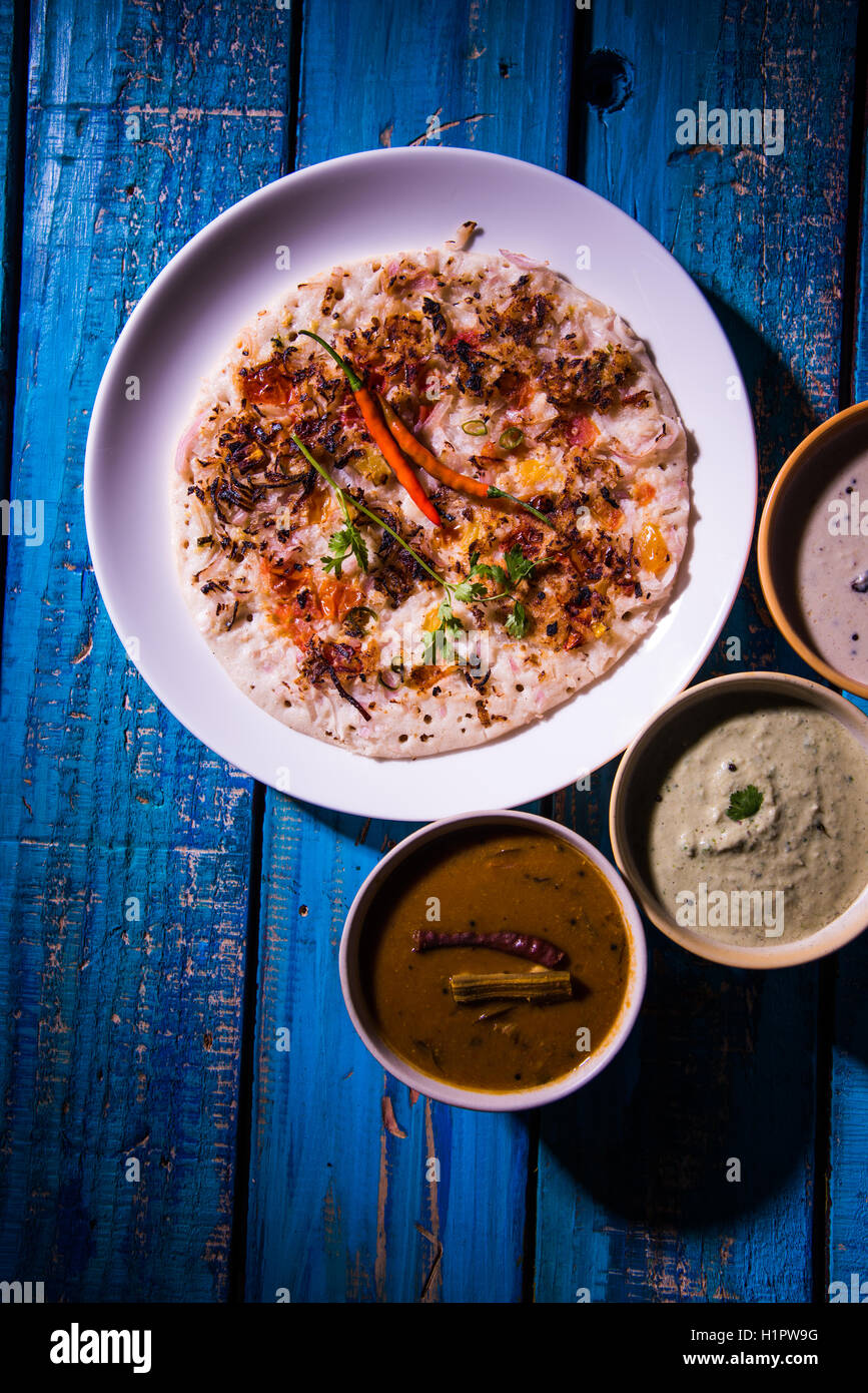 South Indian Food Uttapam or ooththappam or Uthappa is a dosa-like dish ...